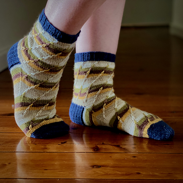 Ravelry: Rustling Reed Socks pattern by Lisa Wicks
