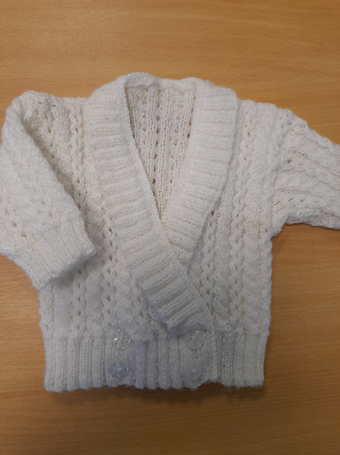 Ravelry: Cross-over baby cardigan pattern by Carol Harvey