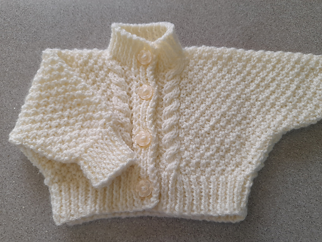 Ravelry: Dolman Moss Baby Cardigan pattern by Carol Harvey
