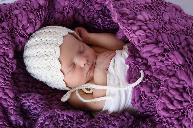 Ravelry: Faux Cable Baby Bonnet pattern by Angie Hartley