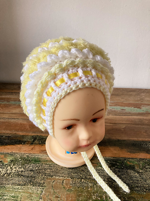 Ravelry: Frilly Baby Bonnet pattern by Adele Uyan