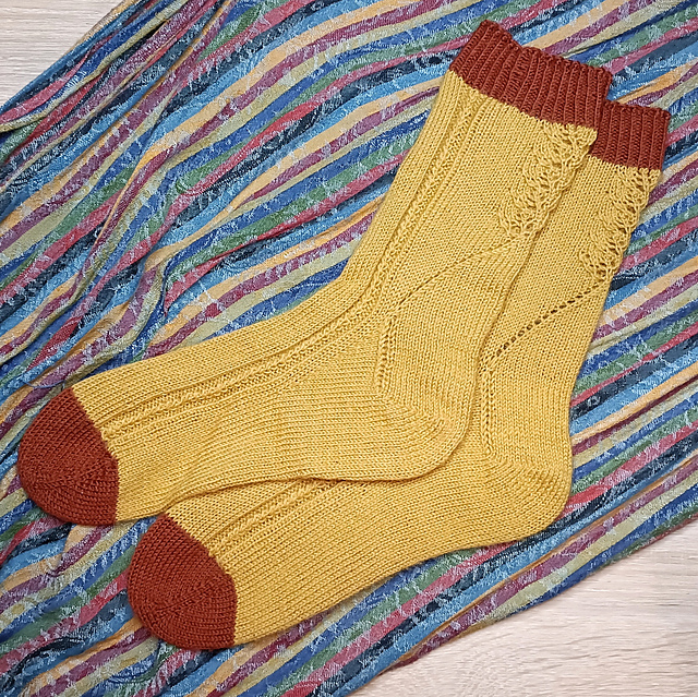 Ravelry: Twisted Lace Socks pattern by Jennifer Anne