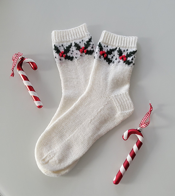Ravelry: Holly Christmas Socks pattern by knitandwave