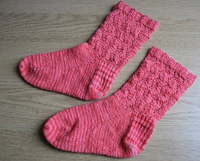 Ravelry: Herringbone Eyelet Fixation Socks pattern by Anna Belinda