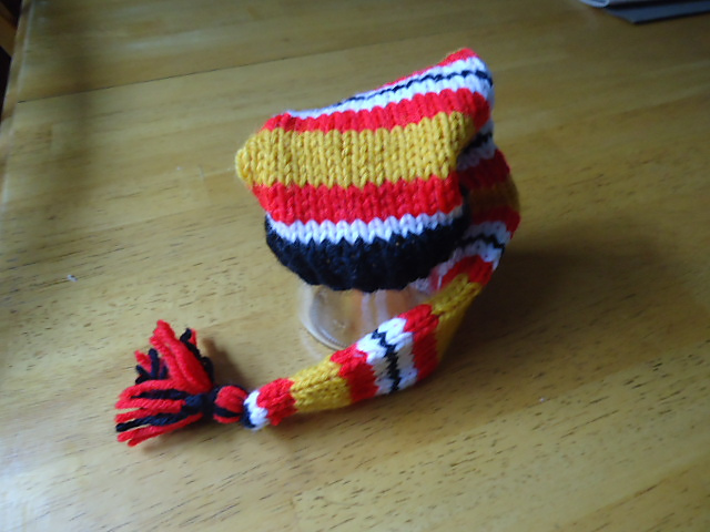 Ravelry: The Triple Dog Dare Topper pattern by Aprylle Cooper