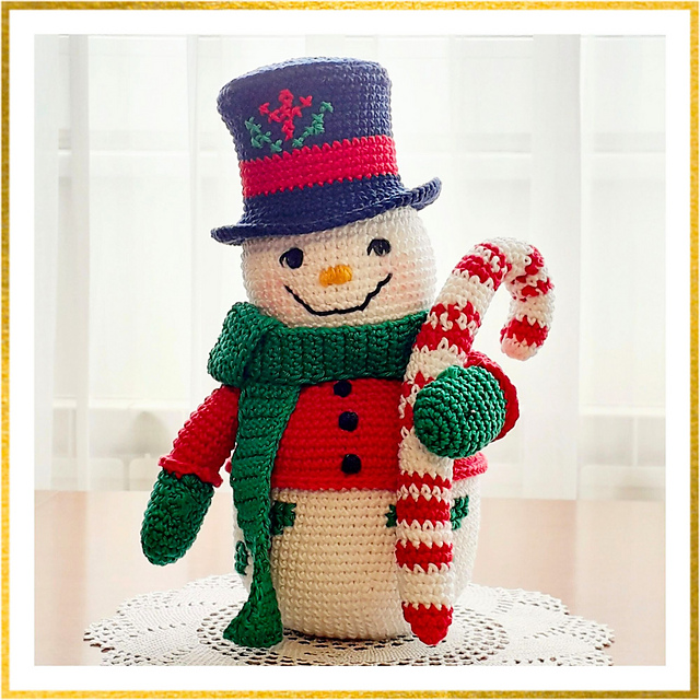 Ravelry: Snowman with Candy Cane pattern by Boja Tesic Desings