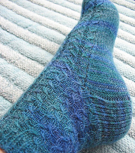 Ravelry: Juani's Braided Socks pattern by Lorna Campbell