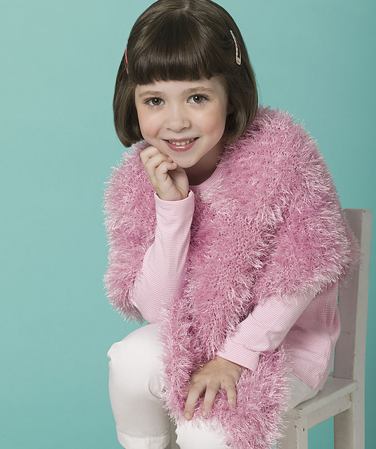 Ravelry: Snuggly Child's Poncho pattern by Red Heart Design Team