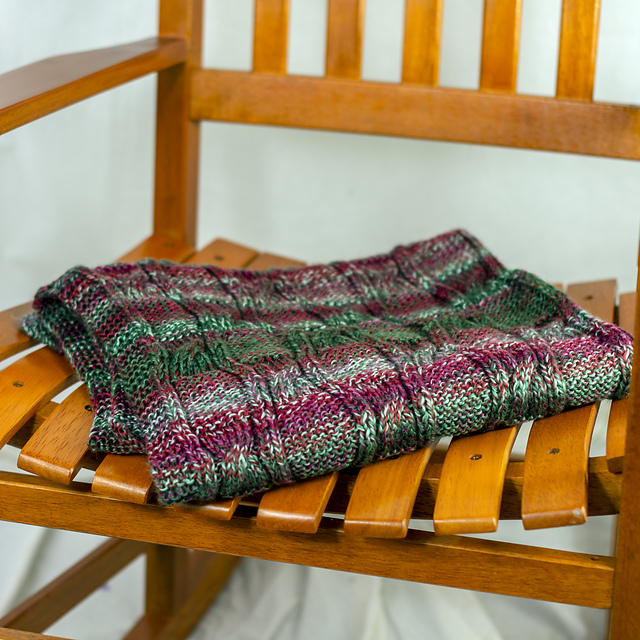 Ravelry: Moving Cables Holiday Throw pattern by Sheila Joynes