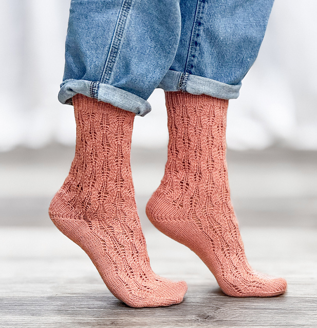 Ravelry: Feather Tail Socks pattern by Christie Archer