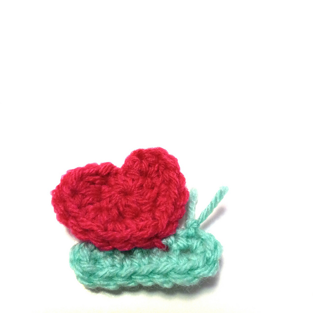 Ravelry: Snail with Heart Applique pattern by Dani West