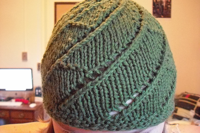 Ravelry: Twisting Ladders Hat pattern by Corinna Rogers