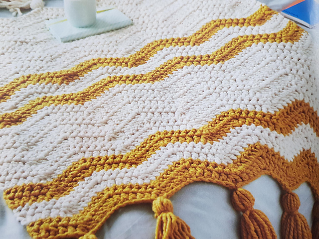 Ravelry: Barley & Cream Chevron Throw pattern by Kate Rowell