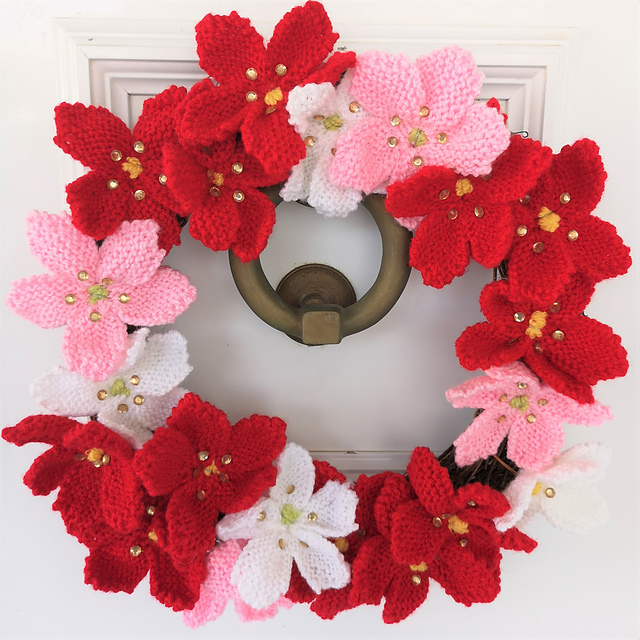 Ravelry: Poinsettia Christmas Ring pattern by Denny Gould