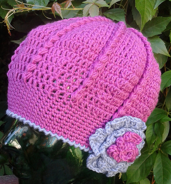 Ravelry: Ladies Hat with Flower pattern by Sonya Gibbons