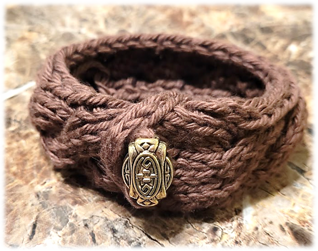 Ravelry: Cabled Bracelets pattern by Janet Bailey