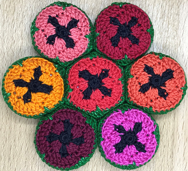Ravelry: Poppy Bottle Cap Coaster pattern by Emma Garside