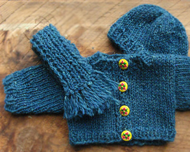 Ravelry: Doll Sweater Set pattern by Peg Richard