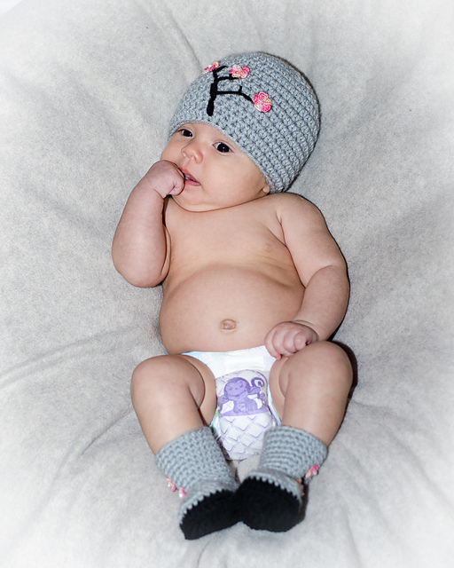 Ravelry: Cherry blossom hat and boots pattern by Sue Mercer