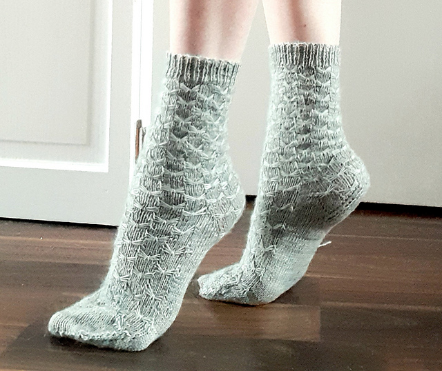 Ravelry: Flock socks pattern by Hanna Gough