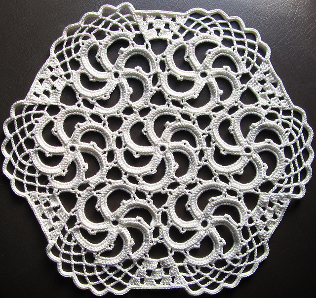 Ravelry: Seven Spiral Doily pattern by Grid Mammal Crafts