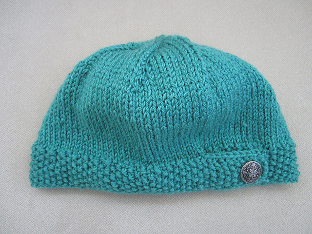 Ravelry: Button Tab Hat pattern by Cynthia Miller