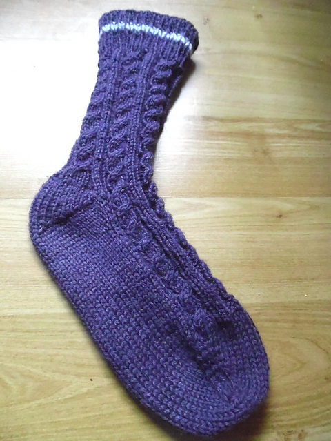 Ravelry: Auntie's Cabled House Socks pattern by Jessica Idreamnsweaters