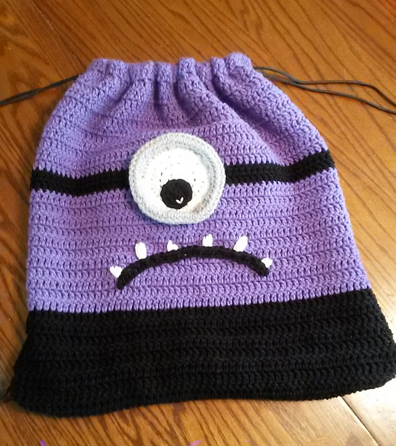 Ravelry: Double-sided Minion Backpack pattern by Jolene Bessant