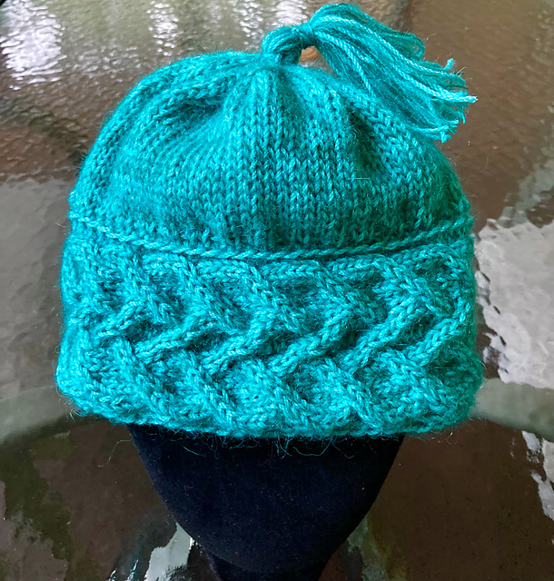 Ravelry: Ripple Tassel Hat pattern by Jeanette Stein