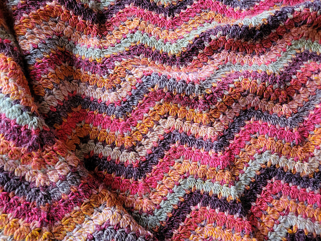 Ravelry: Huzzah Cluster Ripple Blanket pattern by Jennifer Olivarez
