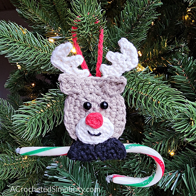 Ravelry: Reindeer Candy Cane Holder Ornament pattern by Jennifer Renaud
