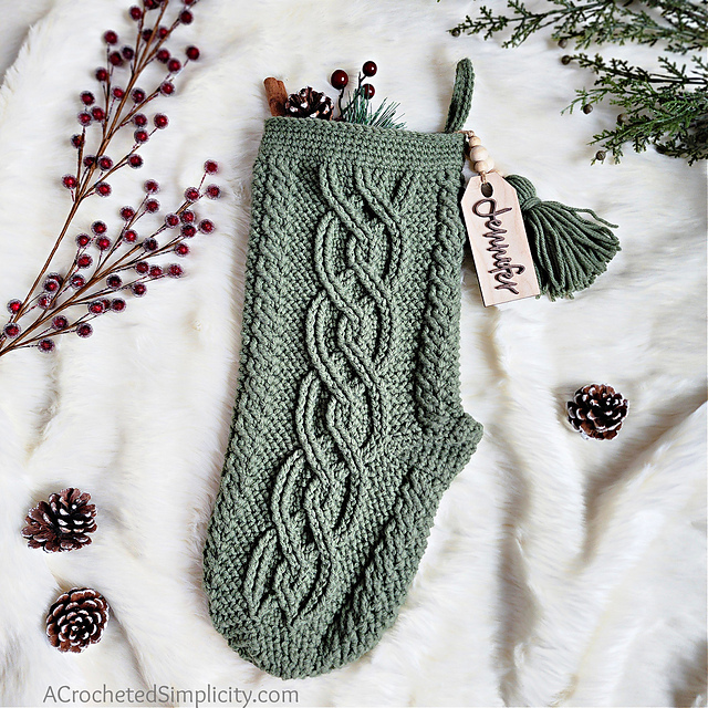 Ravelry: Olivette Cabled Christmas Stocking pattern by Jennifer Renaud