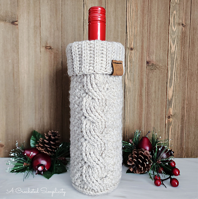 Ravelry: Twisted Textures Wine Cozy pattern by Jennifer Renaud