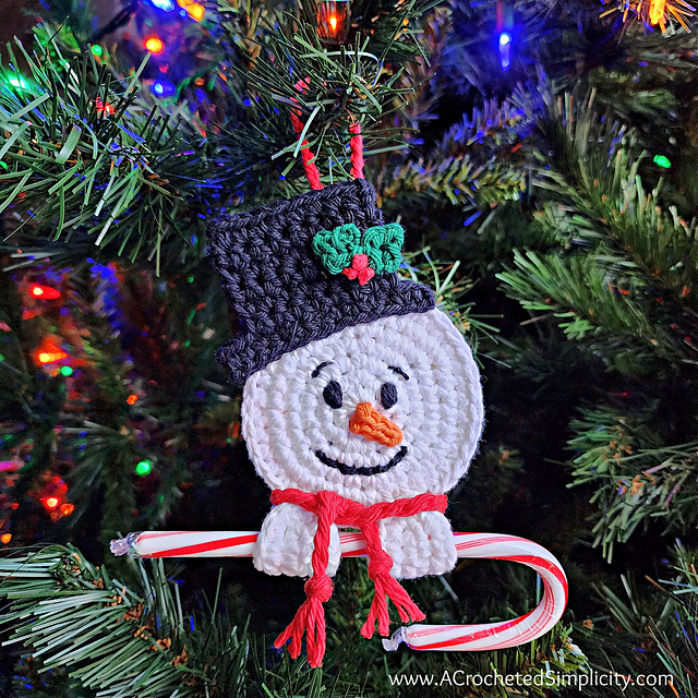 Ravelry: Snowman Candy Cane Holder Ornament pattern by Jennifer Renaud