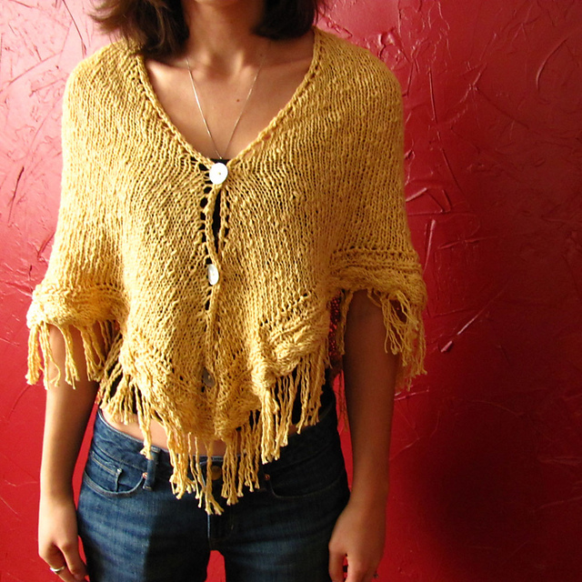 Ravelry: Triangle Shawl/Poncho with Knit-on Cable Fringe pattern by ...