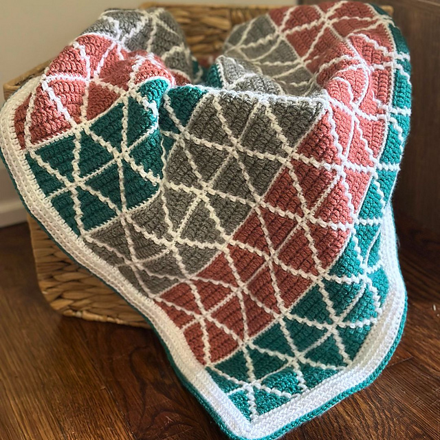 Ravelry: Mosaic Triangles Baby Blanket pattern by Erin Toews