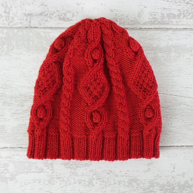 Ravelry: Diamond Cable Hat pattern by Juliet Bernard