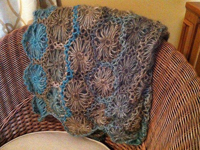 Ravelry: Very Vogue Pinwheel Throw pattern by Herrschners