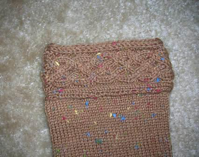 Ravelry: Cabled Cuff Socks pattern by Laura Chau