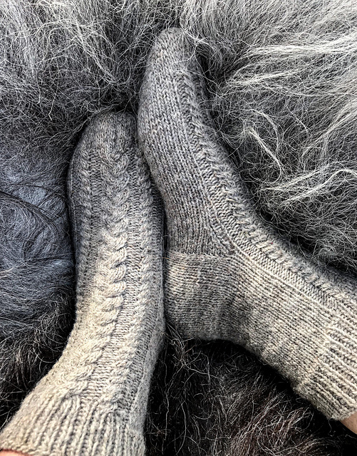 Ravelry: Rustic cable socks pattern by Inga skeie
