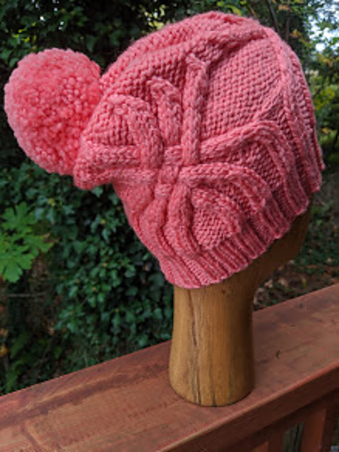 Ravelry: Lotus Knot Toque pattern by Lynette Meek