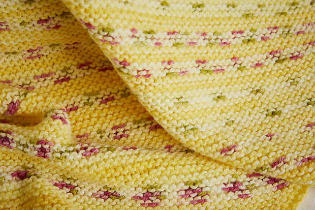 Ravelry: 5575 Petal Pom Pom Blanket pattern by Sirdar
