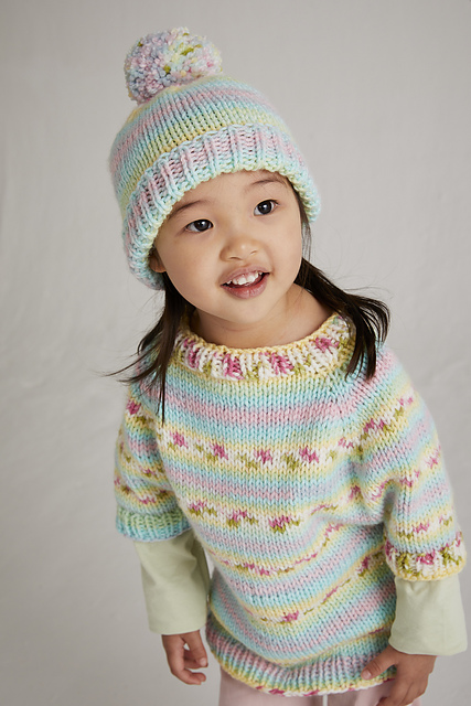 Ravelry: 5570 New Blooms Poncho & Hat pattern by Sirdar