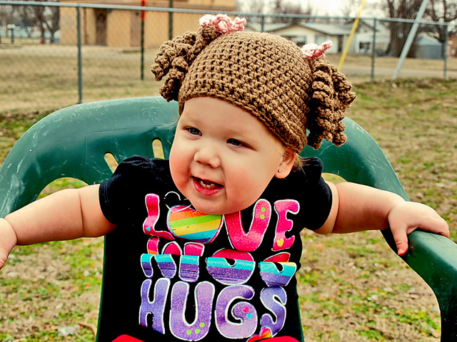 Ravelry: Little Miss Curly Q Beanie pattern by Amber Haskins