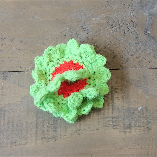 Ravelry: flower spinner fidget toy pattern by Kat Witherall