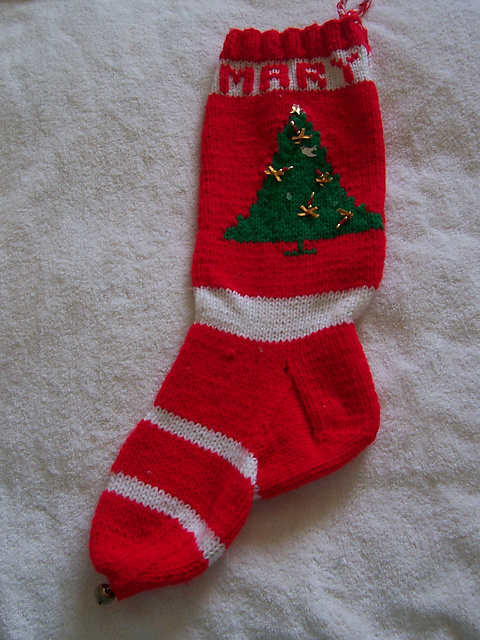 Ravelry: Santa and Tree Stockings pattern by McCall Pattern Company