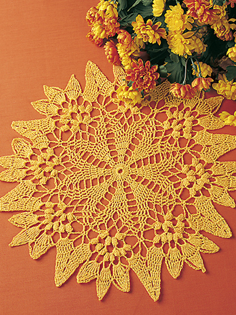 Ravelry: Autumn Marigolds Doily pattern by Josie Rabier