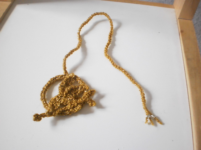 Ravelry: Mockingjay Pin Bookmark pattern by Amy Noelle Walker