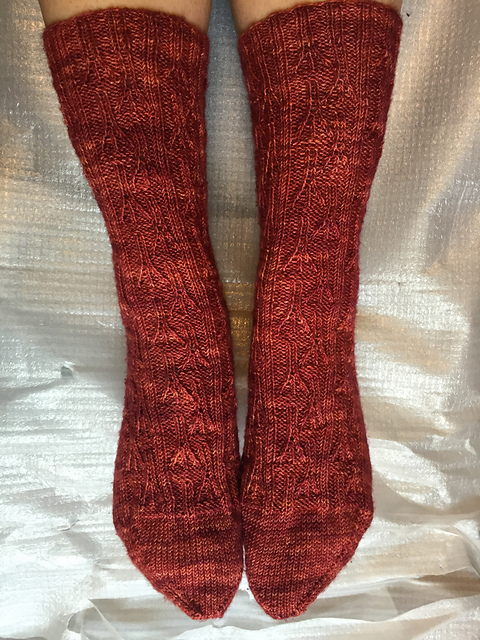 Ravelry: Flamingo Tracks Socks pattern by Audrey Loopy
