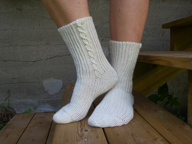 Ravelry: Cabled slip stitch socks pattern by Anna Lindmark